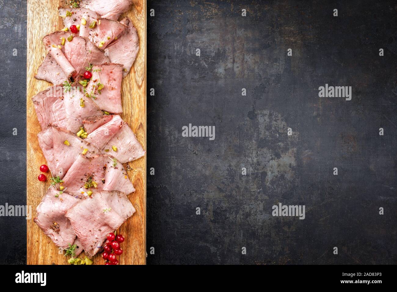 Traditional lunch meat with sliced cold cuts roast beef decorated with ...