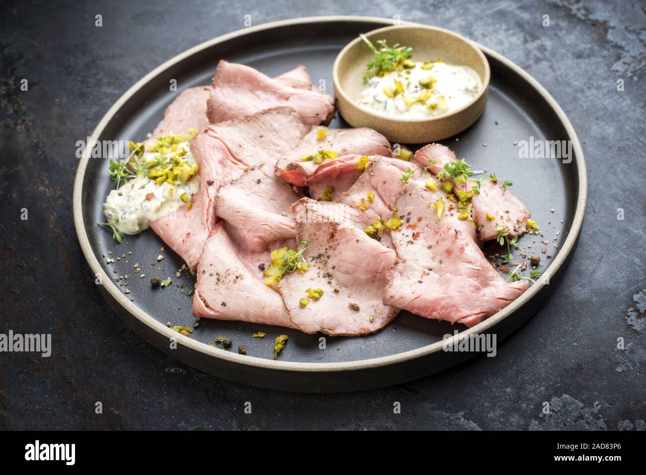 Traditional lunch meat with sliced cold cuts roast beef and remoulade ...