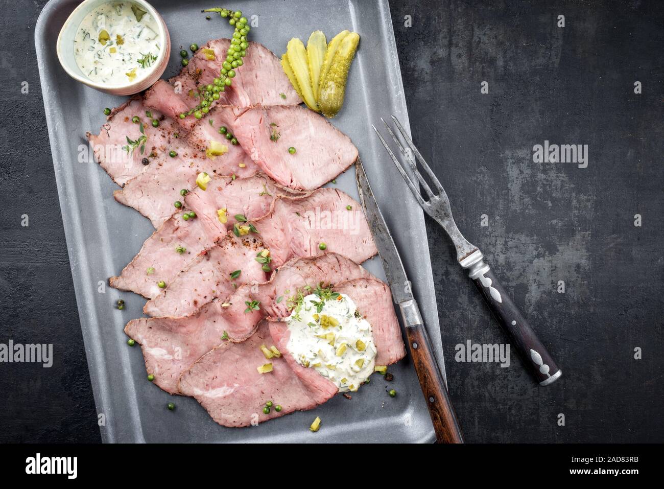 Traditional lunch meat with sliced cold cuts roast beef and remoulade ...