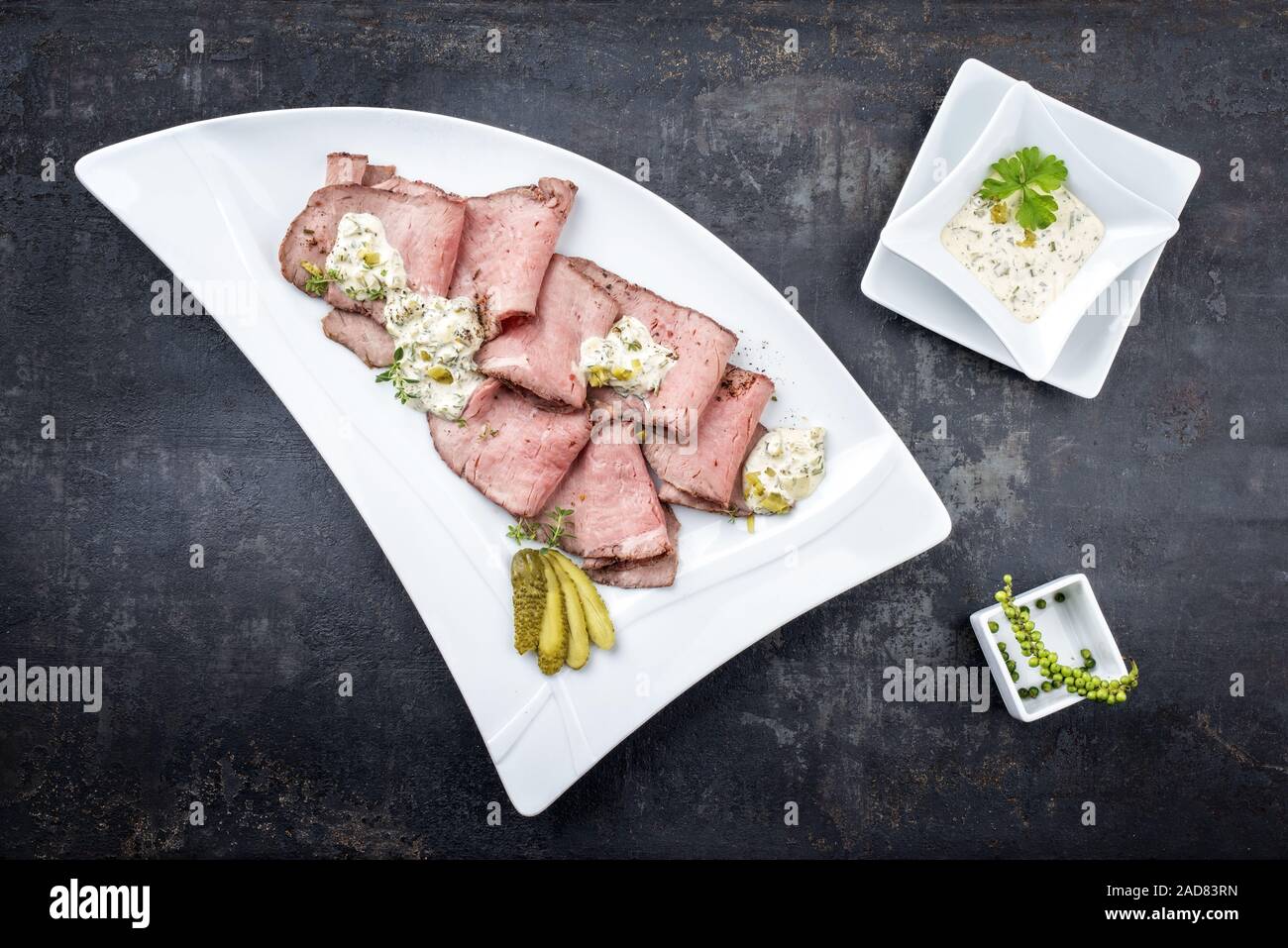 Traditional lunch meat with sliced cold cuts roast beef and remoulade ...