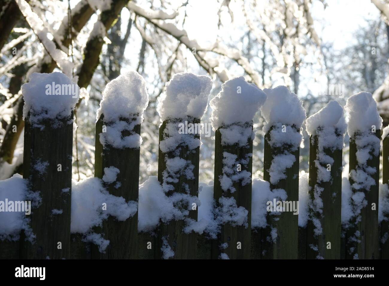 Wooden Fence with snow Stock Photo - Alamy