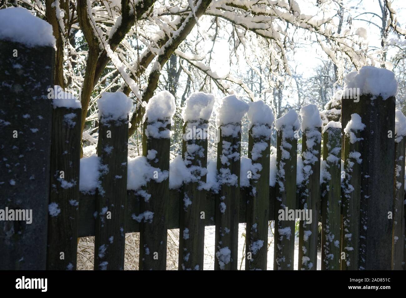 Wooden Fence with snow Stock Photo - Alamy