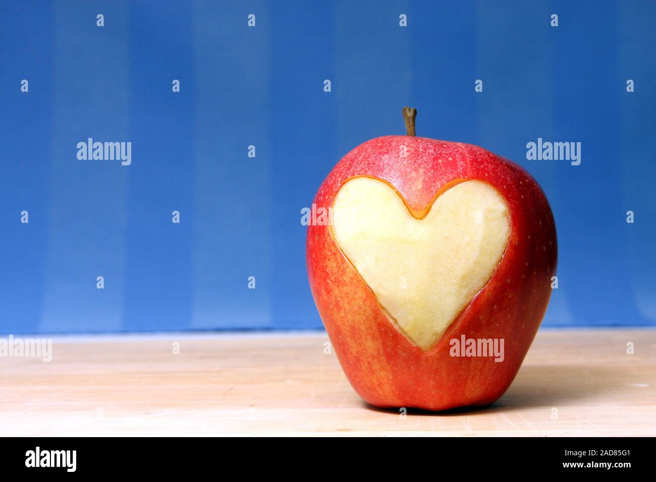 Apple with heart Stock Photo - Alamy