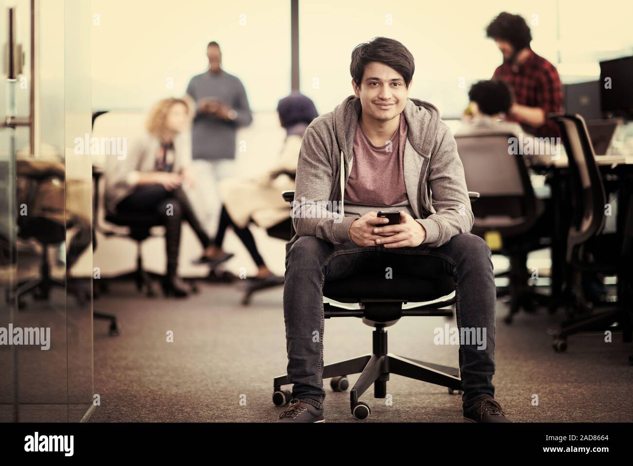 software developer using mobile phone Stock Photo - Alamy