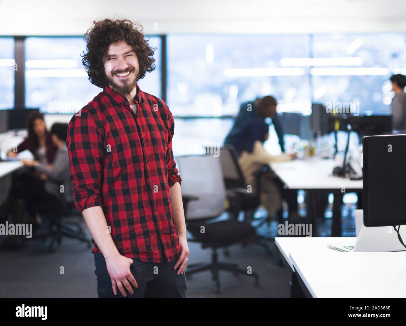 Portrait of smiling male software developer Stock Photo - Alamy