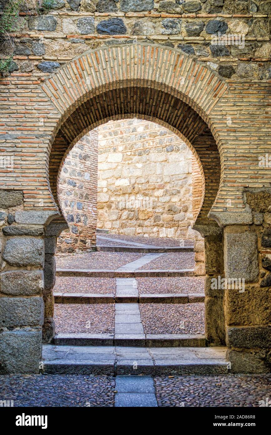 Toledo, gate in city wall Stock Photo - Alamy