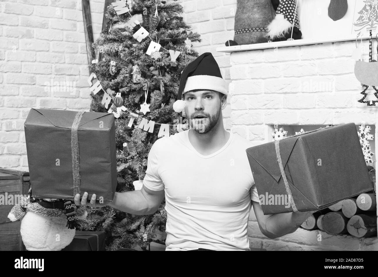 Santa hat boxes gifts Black and White Stock Photos & Images - Alamy