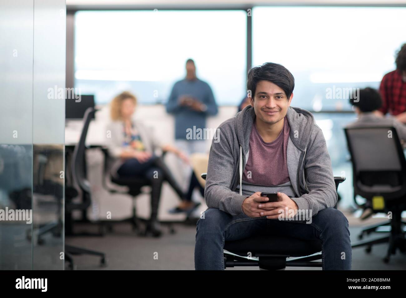 software developer using mobile phone Stock Photo - Alamy