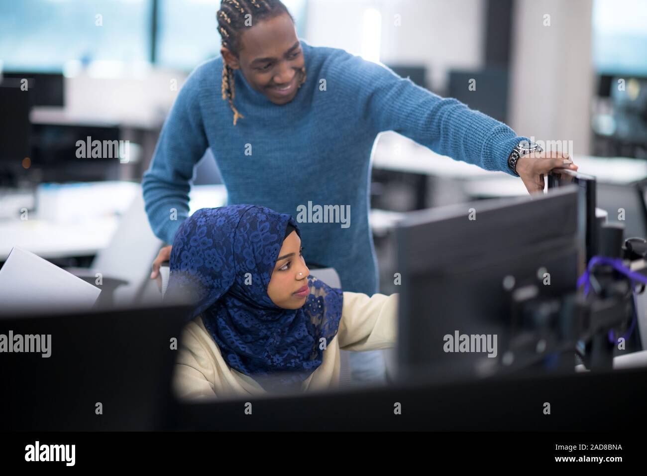 young black muslim female software developer at work Stock Photo - Alamy