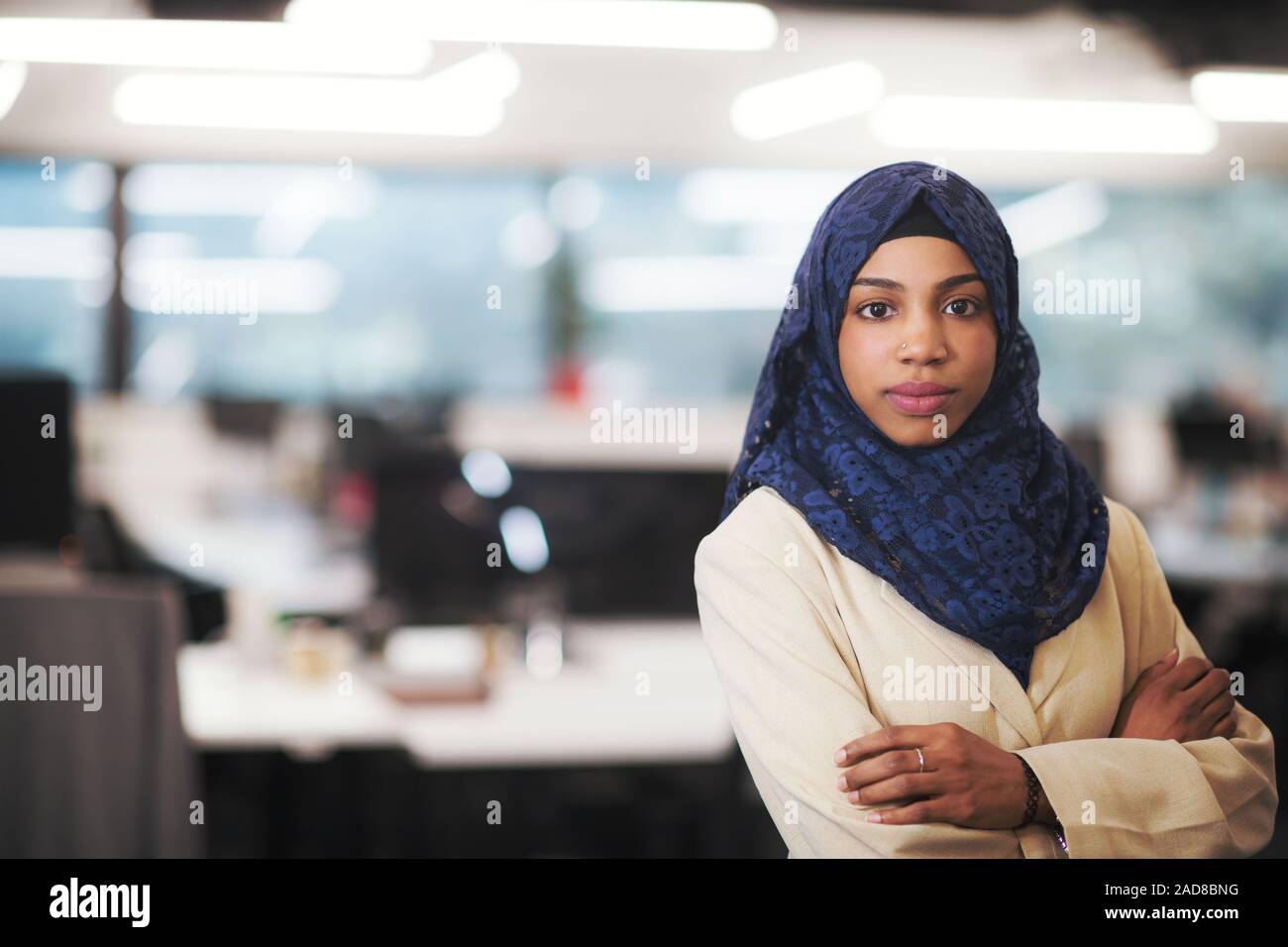 Portrait of black muslim female software developer Stock Photo - Alamy