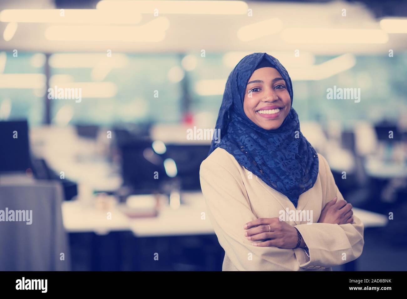 Portrait of black muslim female software developer Stock Photo - Alamy