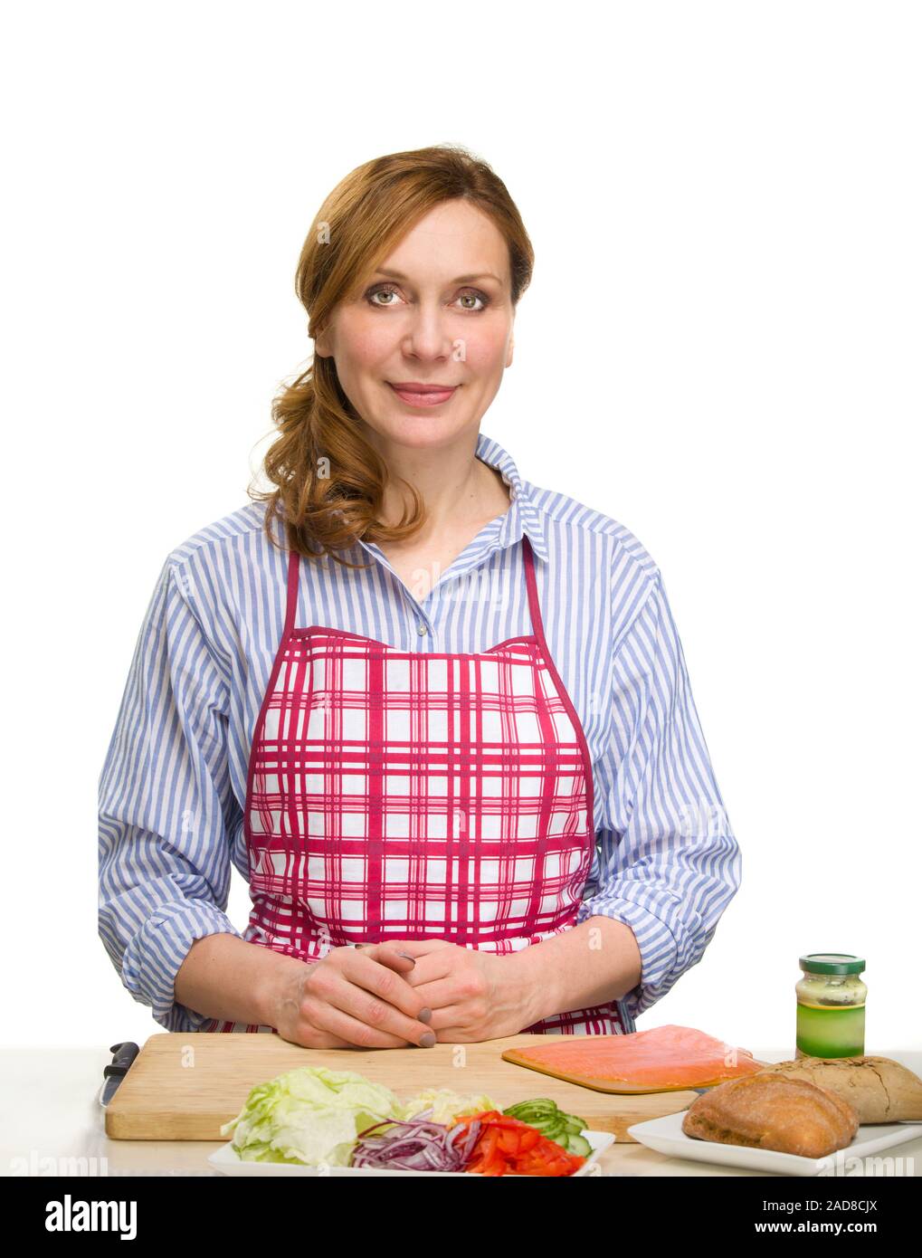 Beautiful Adult Woman Cooking in the kitchen Stock Photo - Alamy