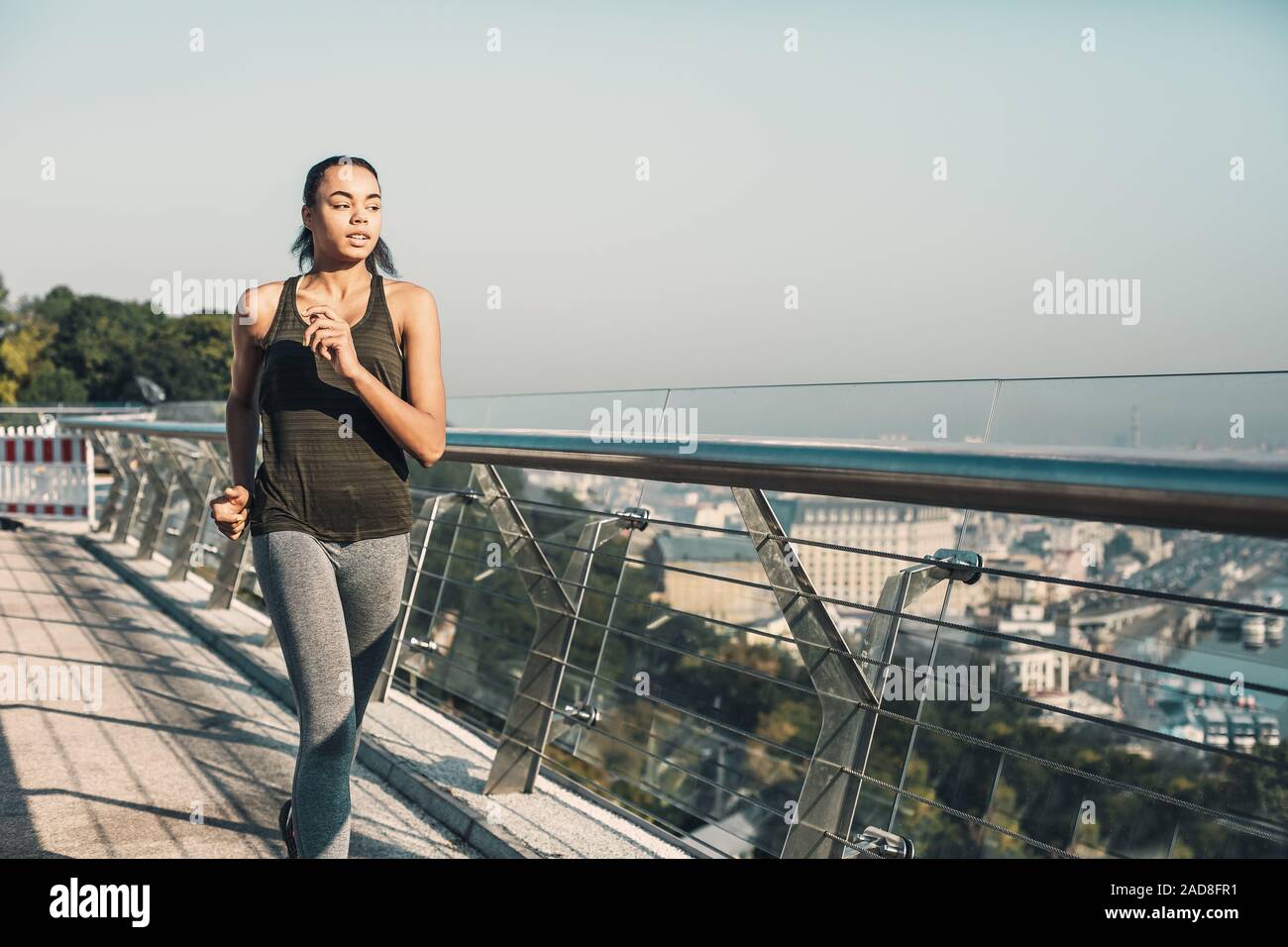 Professional female runner fast running hi-res stock photography and ...