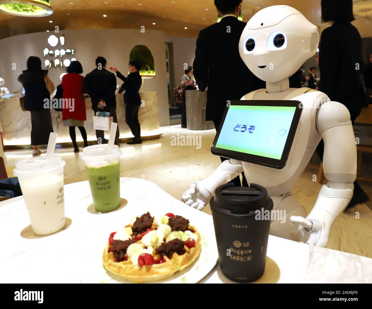 Tokyo, Japan. 3rd Dec, 2019. Softbank's humanoid robot Pepper attends ...