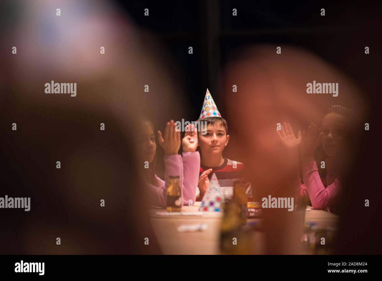 The young boy joyfully celebrating his birthday Stock Photo - Alamy