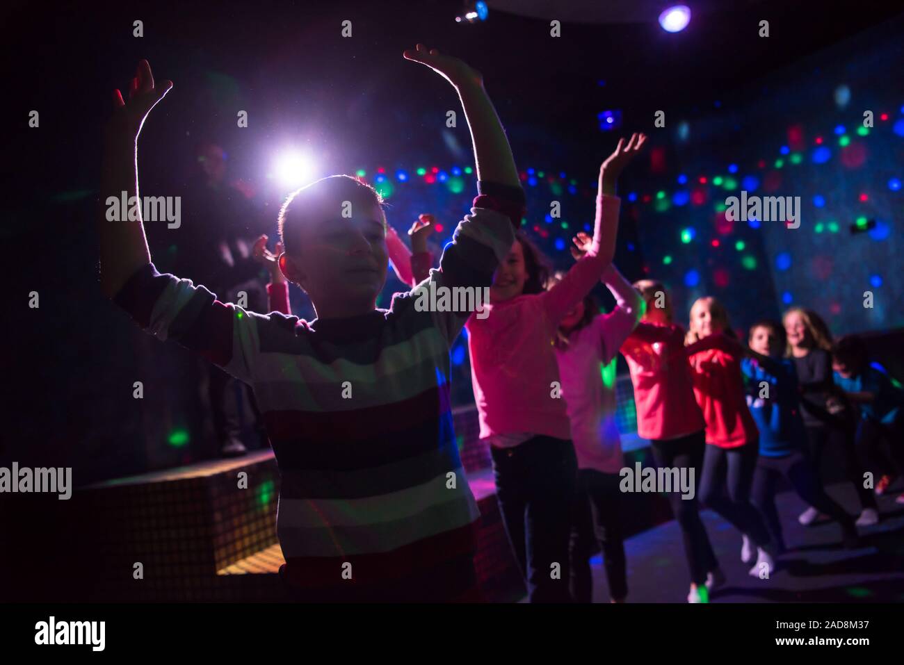 Kids neon disco party Stock Photo - Alamy