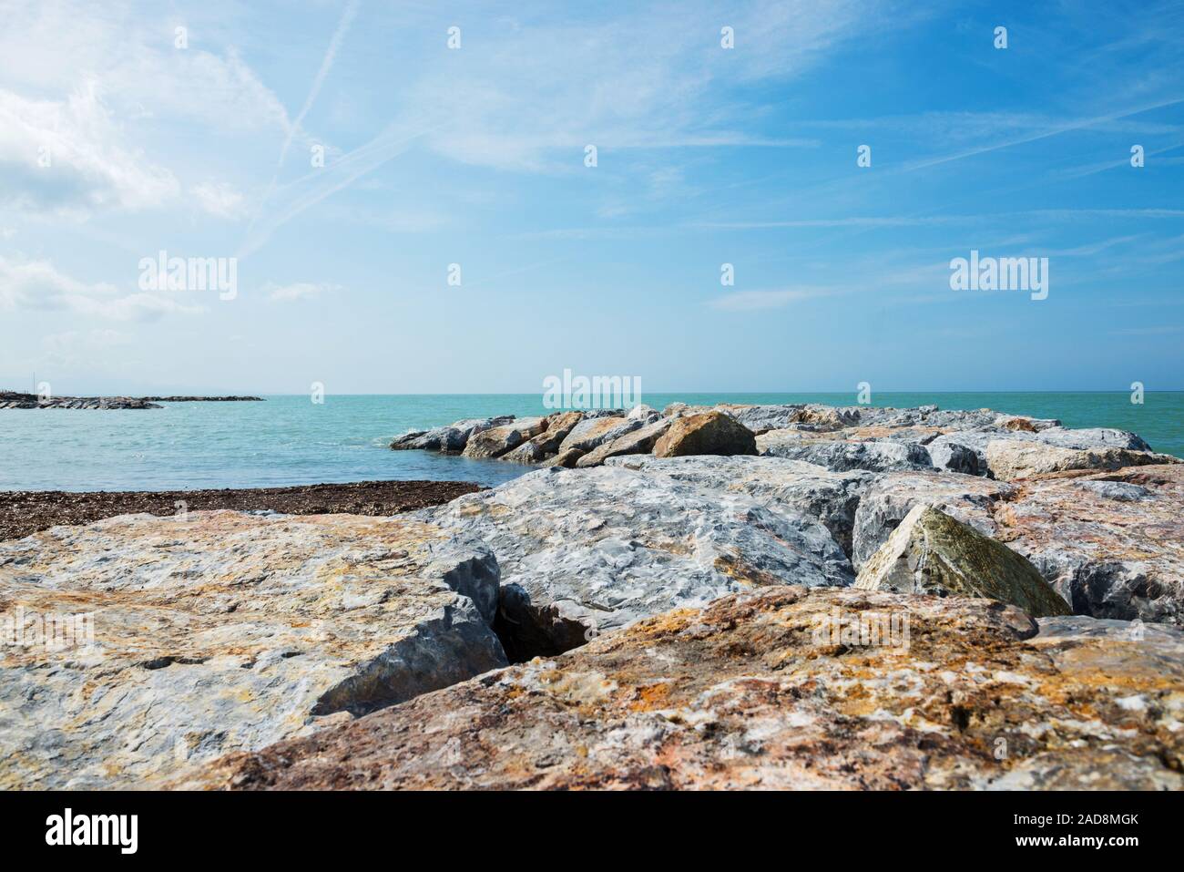 Beautiful azure sea and the rocky beach, Tyrrhenian sea in Tuscany ...