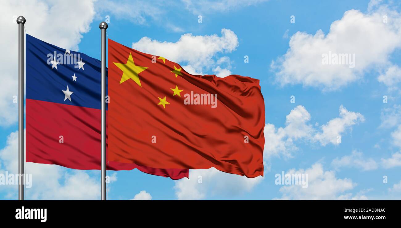 Samoa and China flag waving in the wind against white cloudy blue sky ...