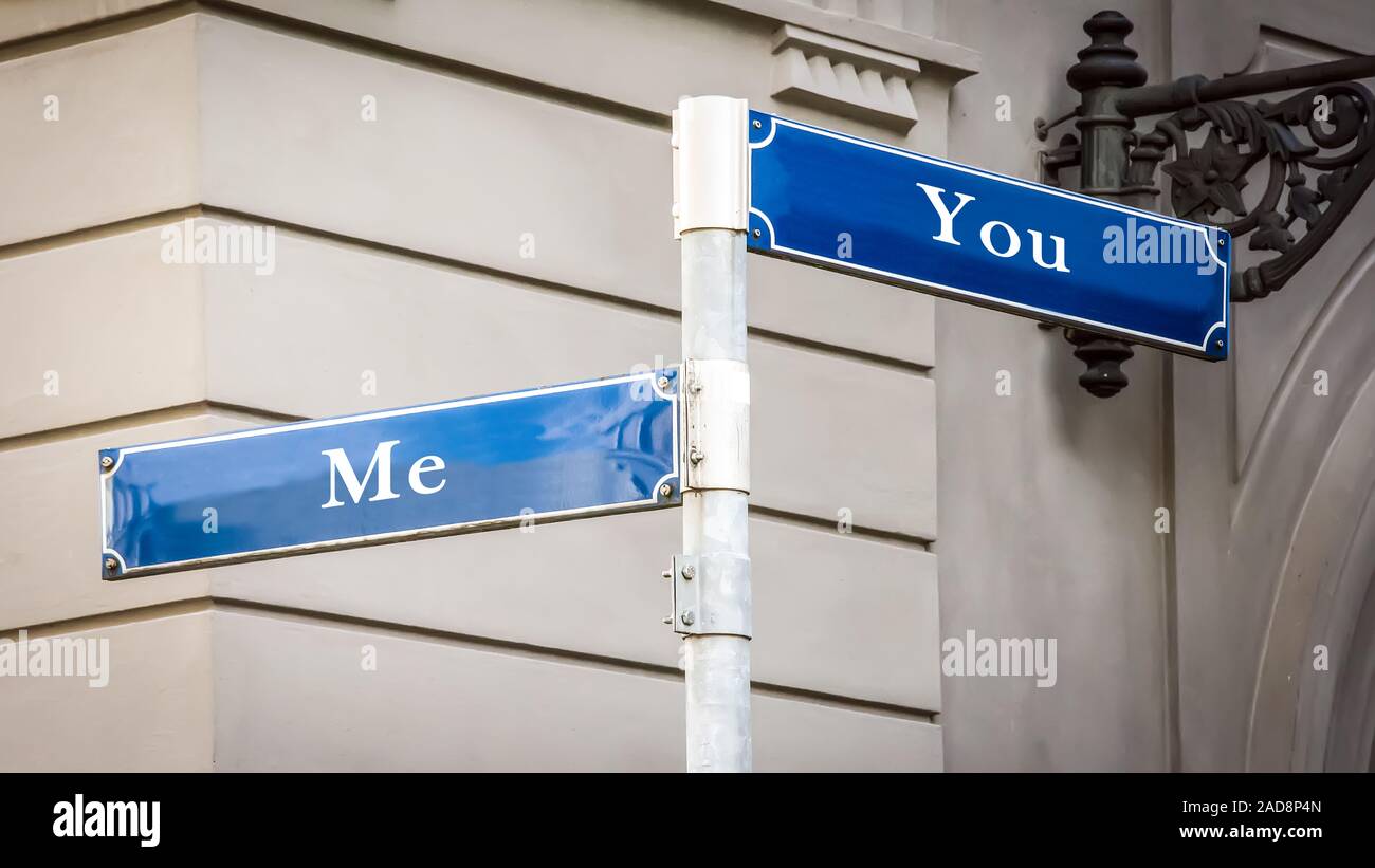 Street Sign Me versus You Stock Photo - Alamy