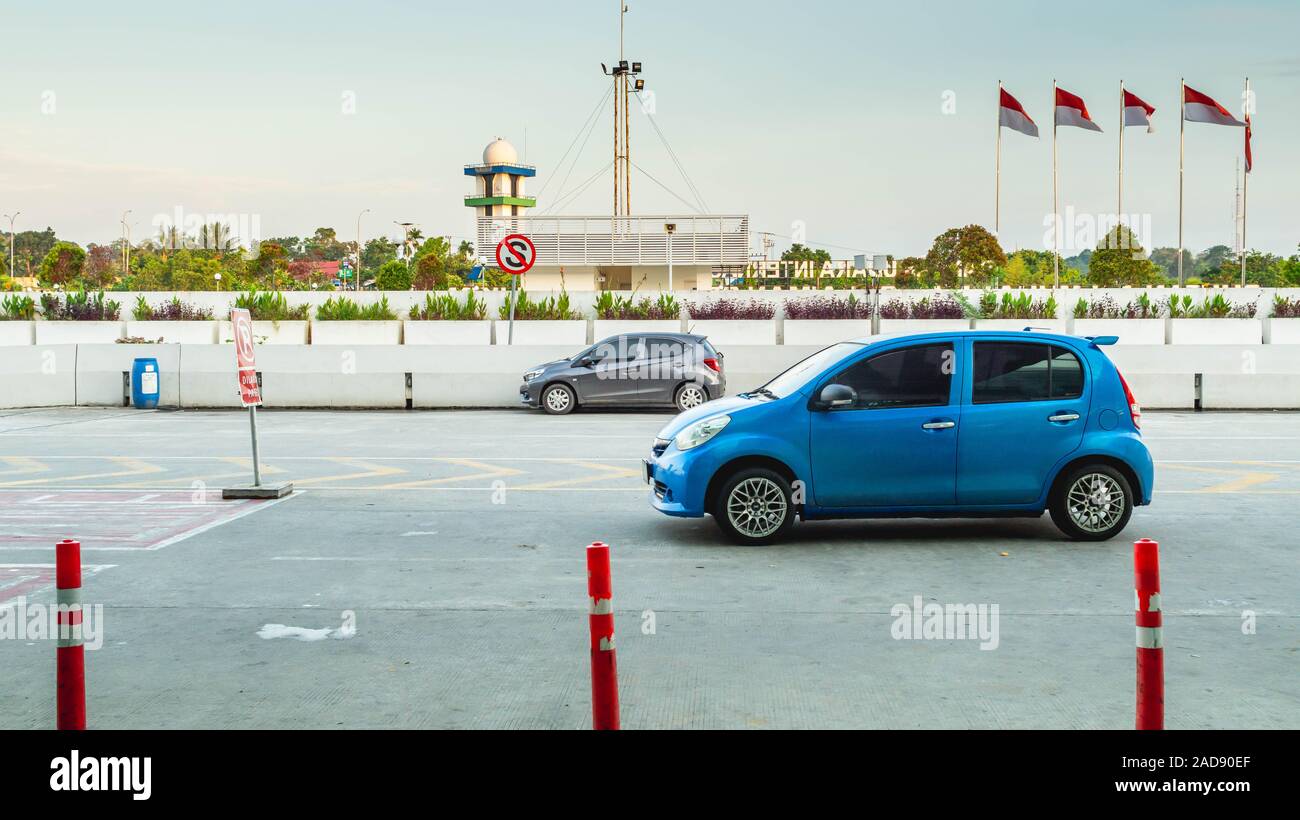 violation to the traffic sign. A car stop under stop restriction sign ...