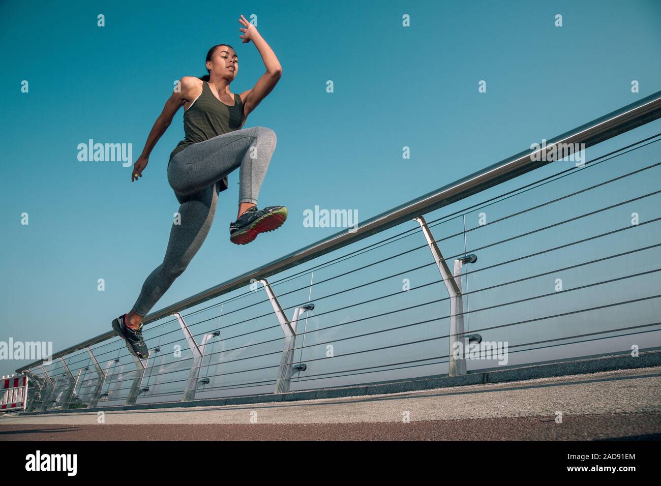 Marathon runner in motion outdoors stock photo Stock Photo - Alamy