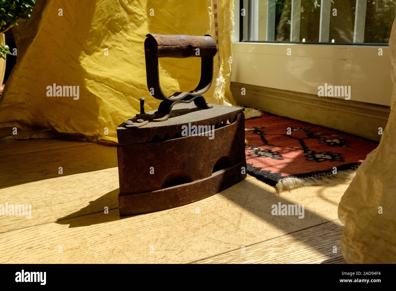 Vintage iron in interior an modern house Stock Photo - Alamy
