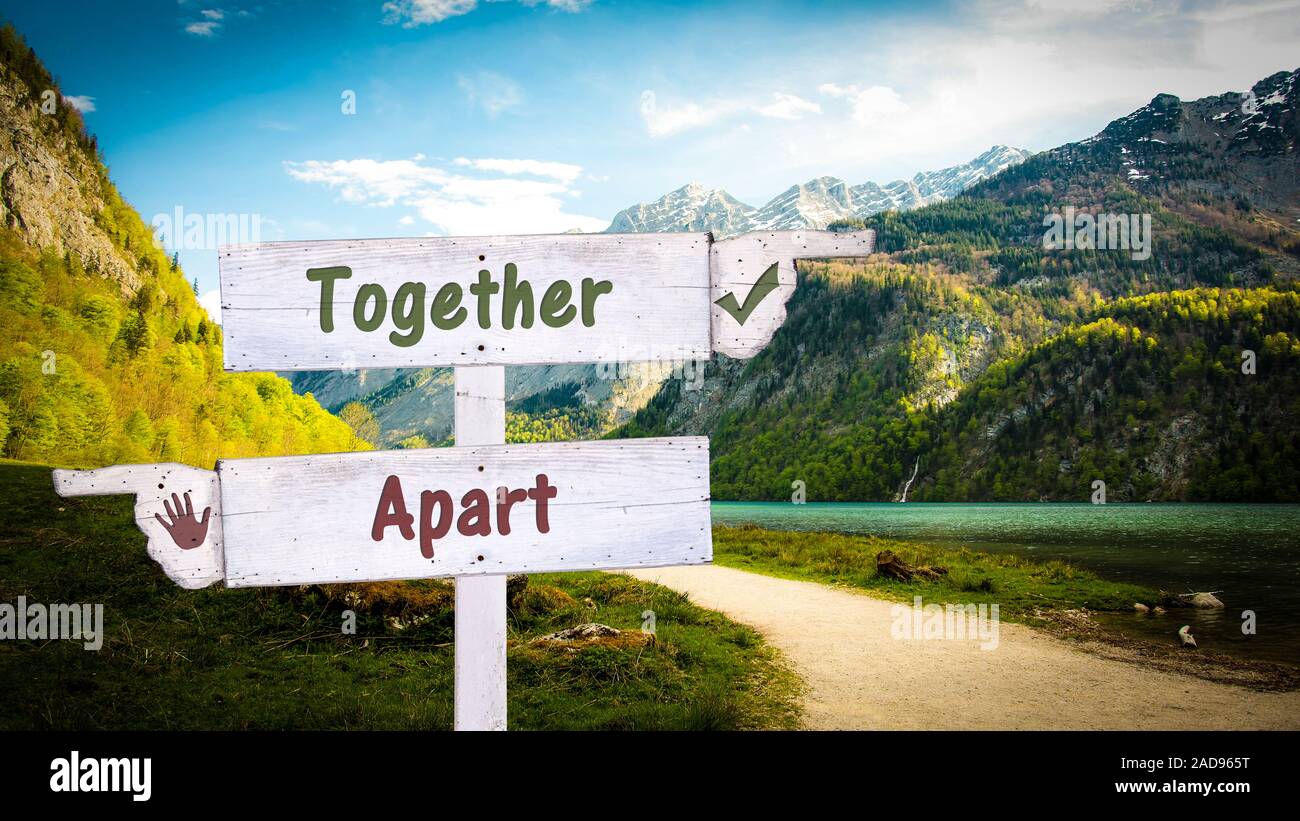 Street Sign to Together versus Apart Stock Photo - Alamy