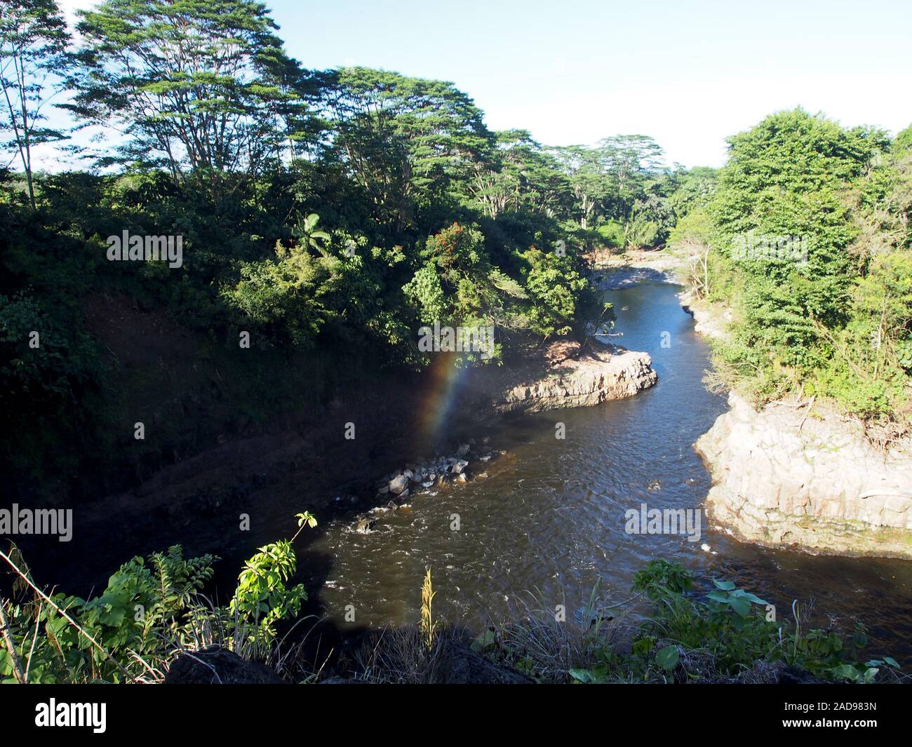 Rainbow in “Boiling Pots,” Pe‘epe‘e Falls which is a section of the 18 ...