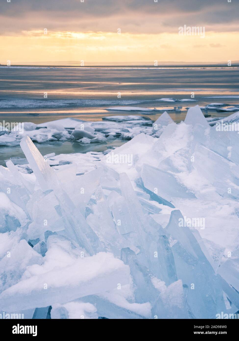 Ice on the lake in winter Stock Photo - Alamy