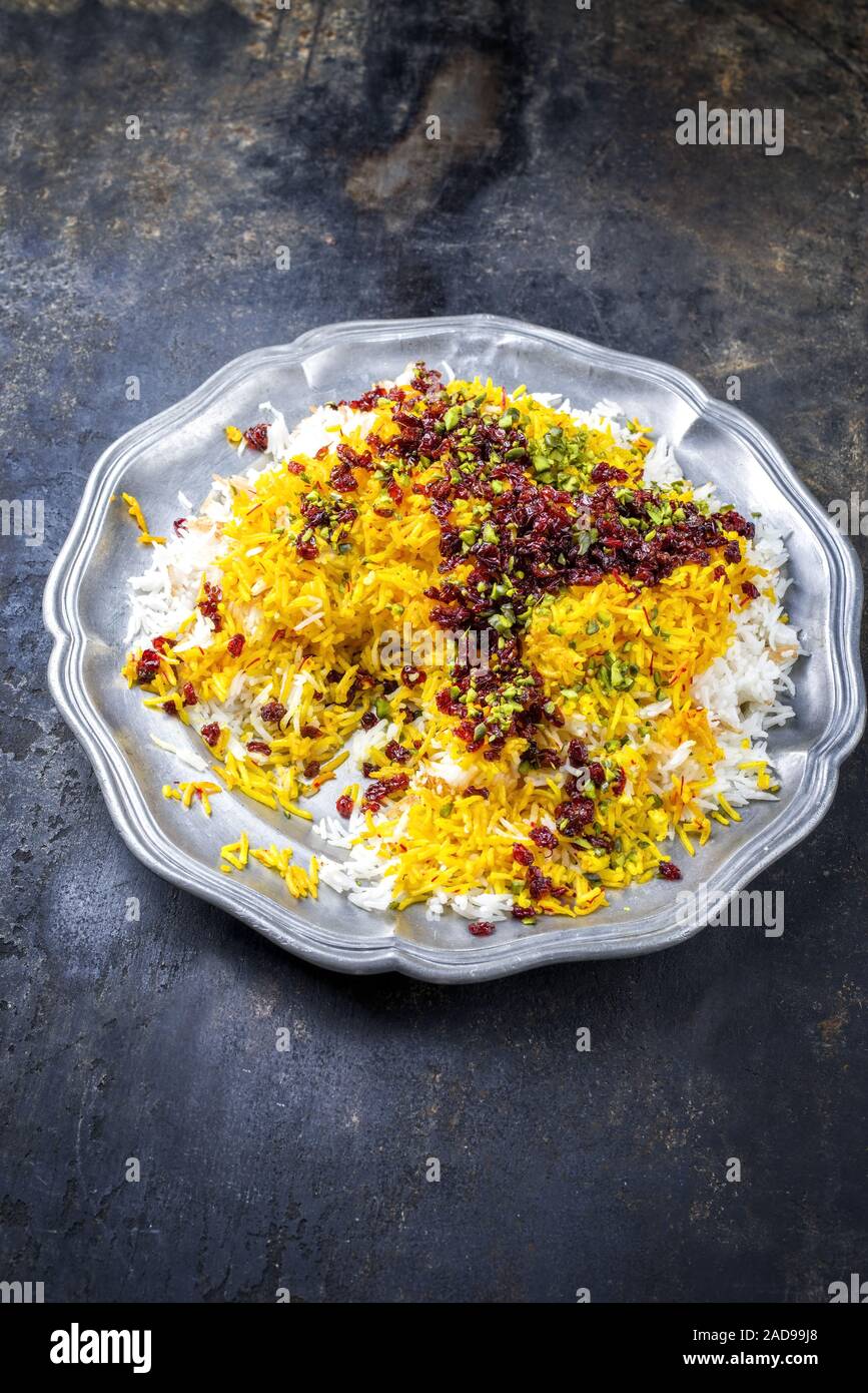 Traditional Iranian steamed saffron rice with berberis and pistachios ...