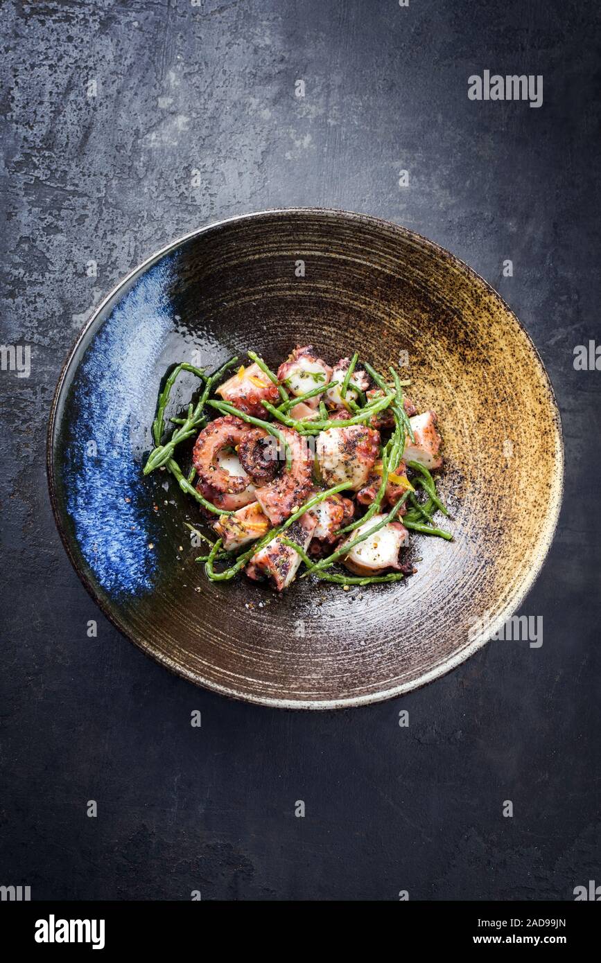 Traditional French octopus braised cooked with Salicornia Stock Photo ...
