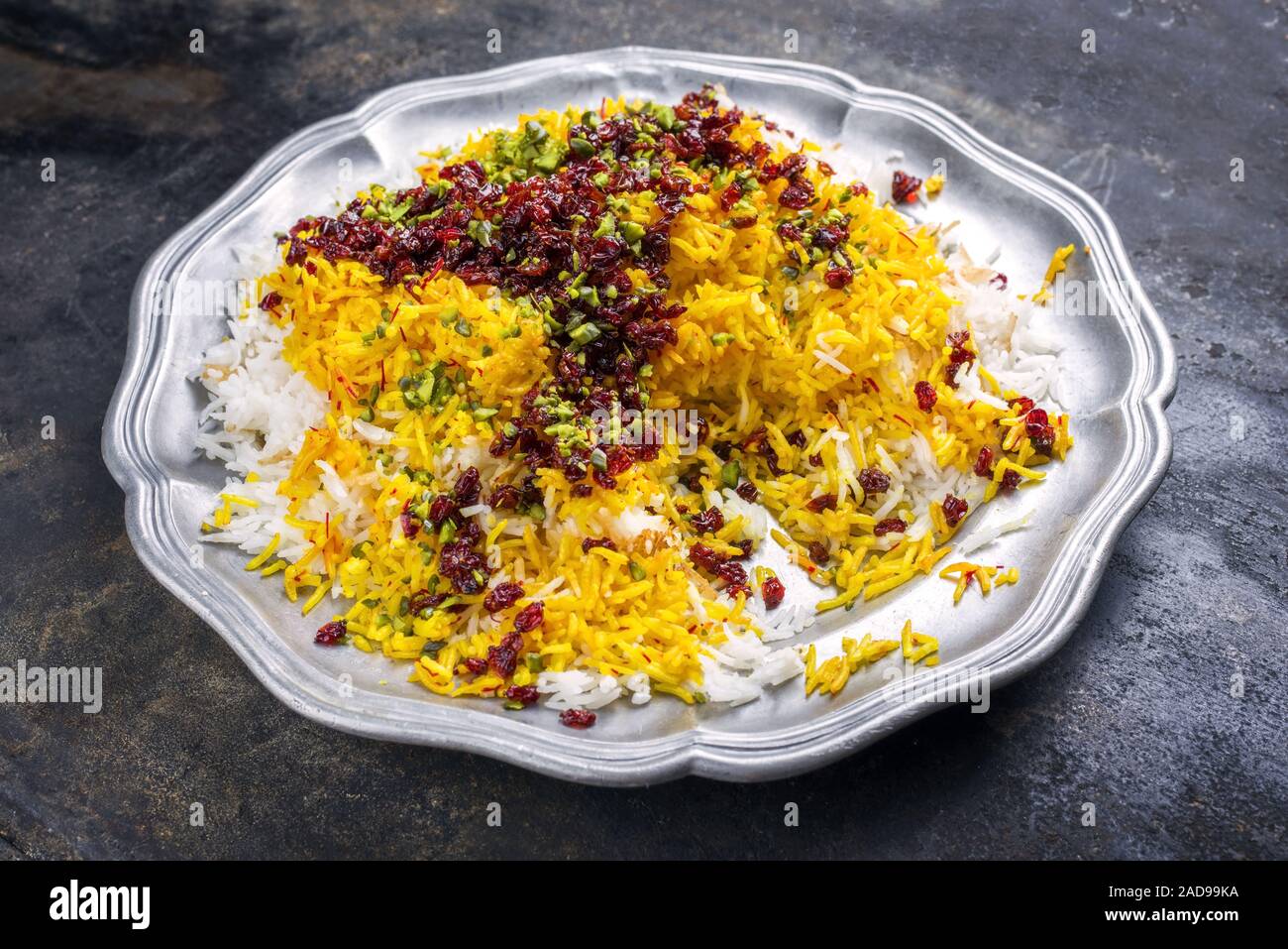 Rice on silver plate hi-res stock photography and images - Alamy