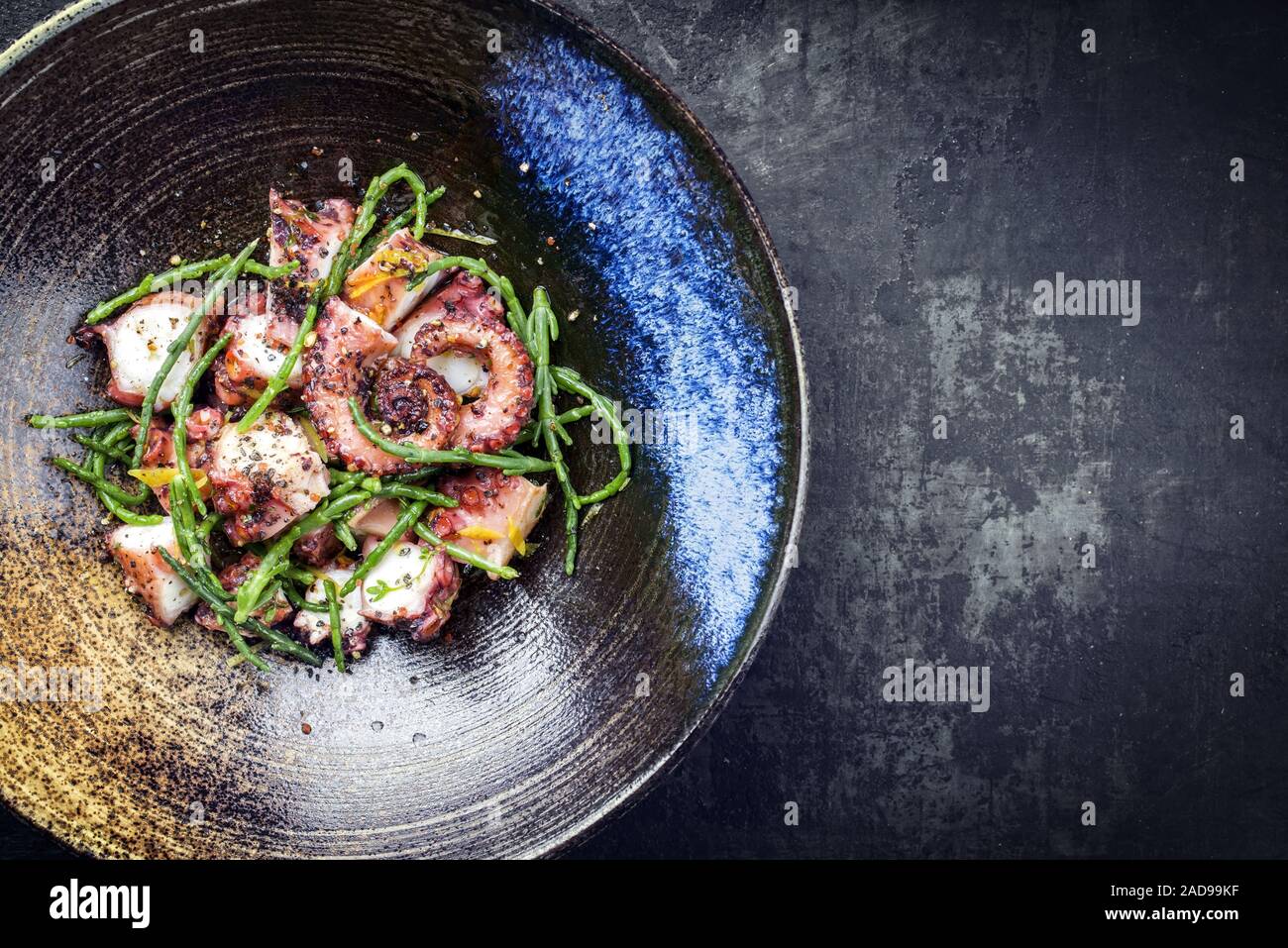 Traditional French octopus braised cooked with Salicornia Stock Photo ...
