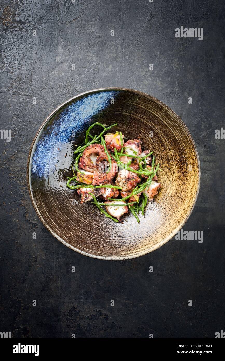Traditional French octopus braised cooked with Salicornia Stock Photo ...