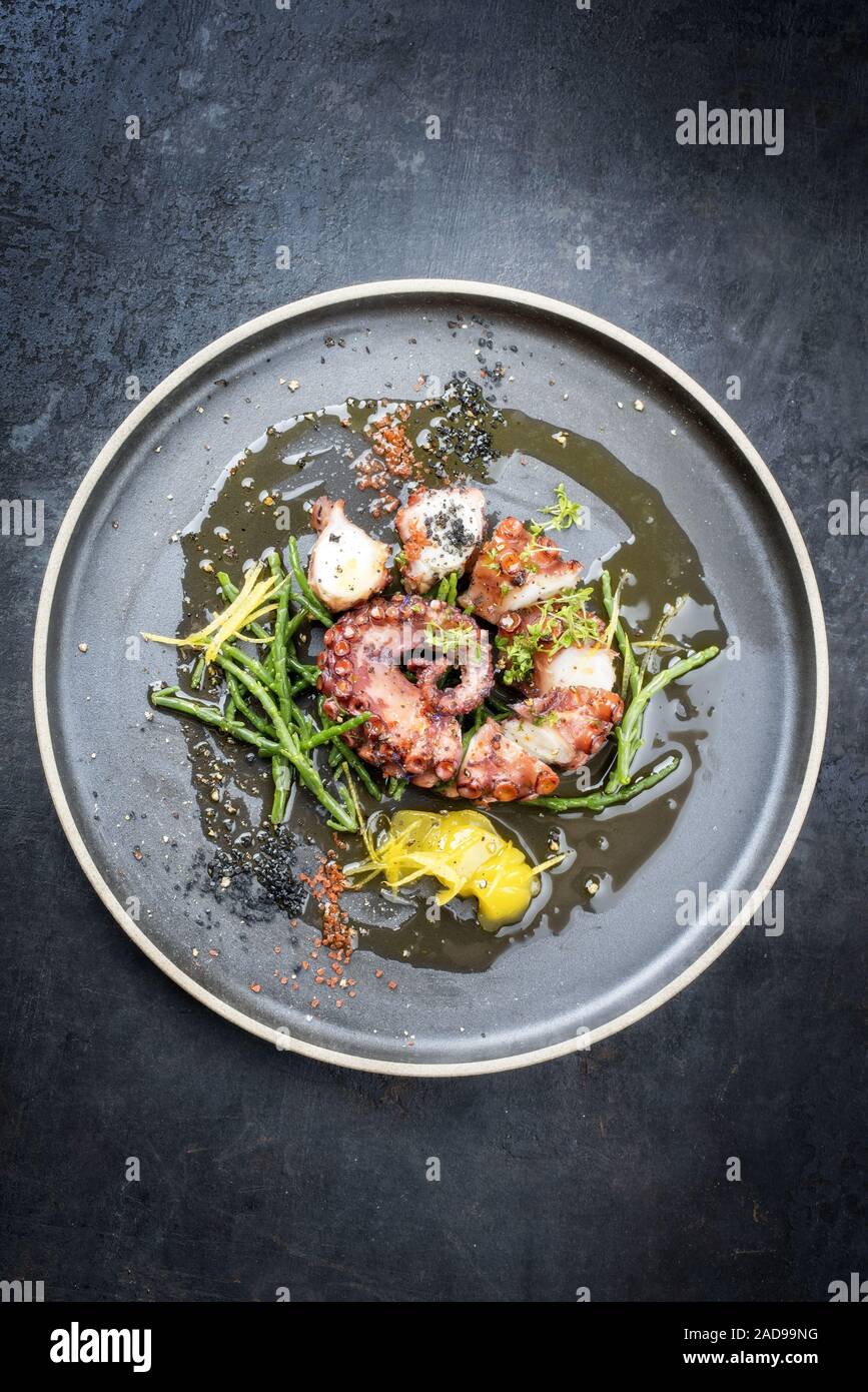 Traditional French octopus braised cooked with Salicornia Stock Photo ...