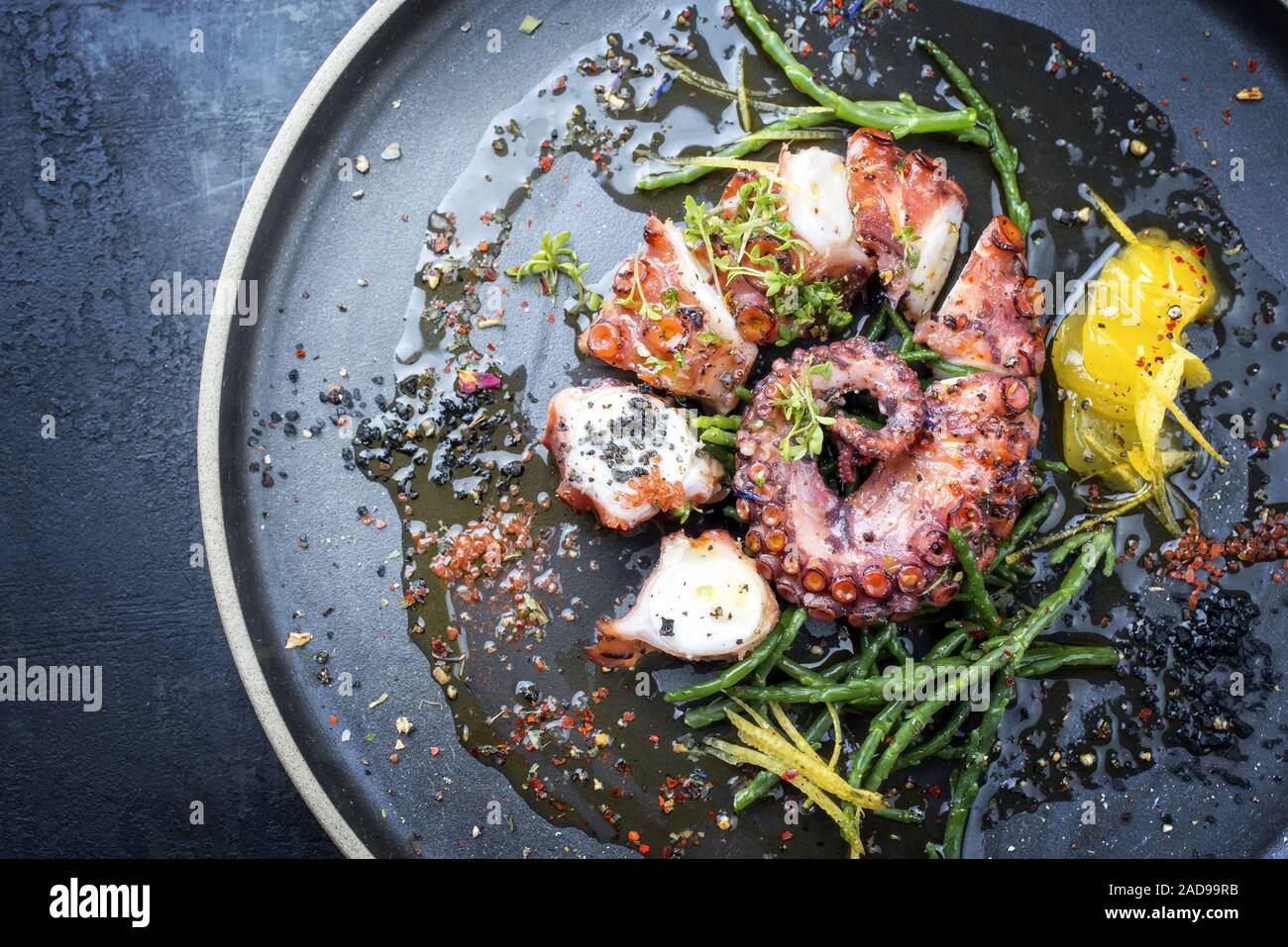 Traditional French octopus braised cooked with Salicornia Stock Photo ...