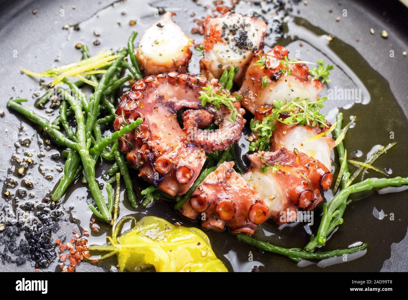 Traditional French octopus braised cooked with Salicornia Stock Photo ...