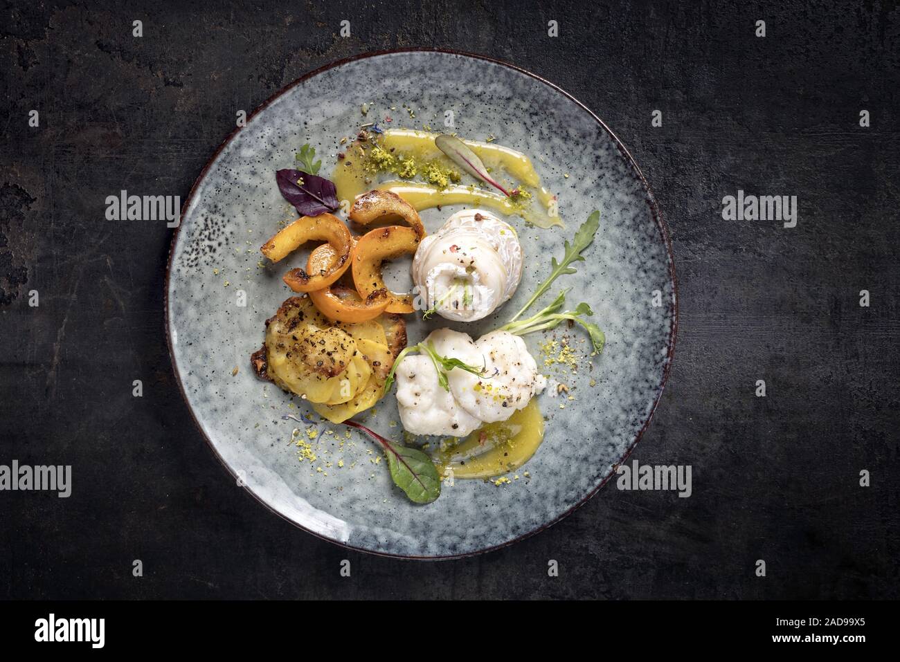 Fried Norwegian skrei cod fish filet with potatoes Stock Photo - Alamy