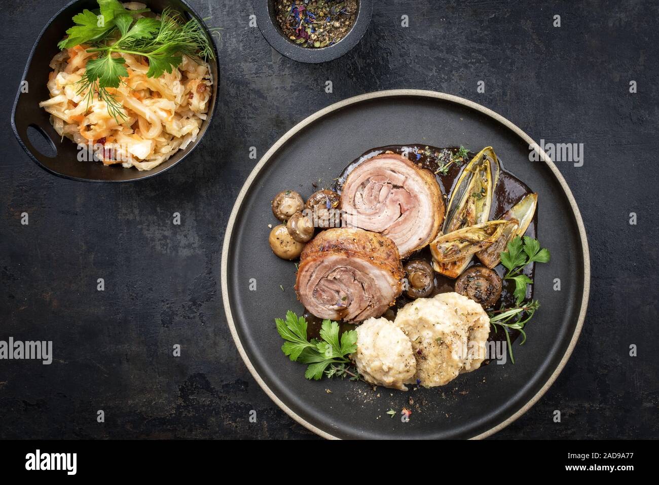 Traditional rolled boar roast with dumpling Stock Photo - Alamy