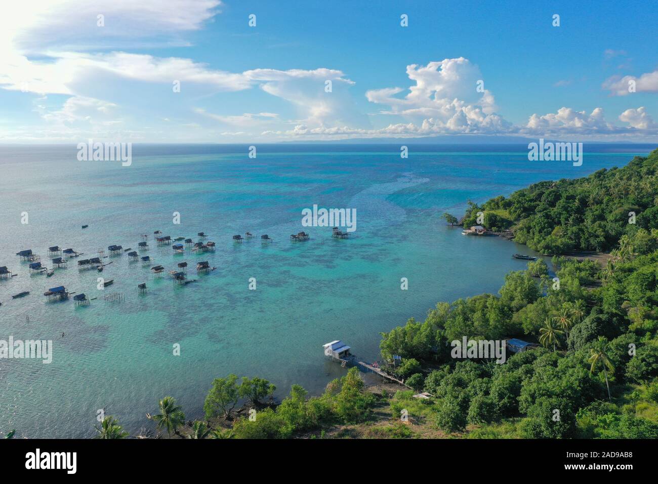 Aerial view of ocean, island and sea gypsy water village in Semporna ...