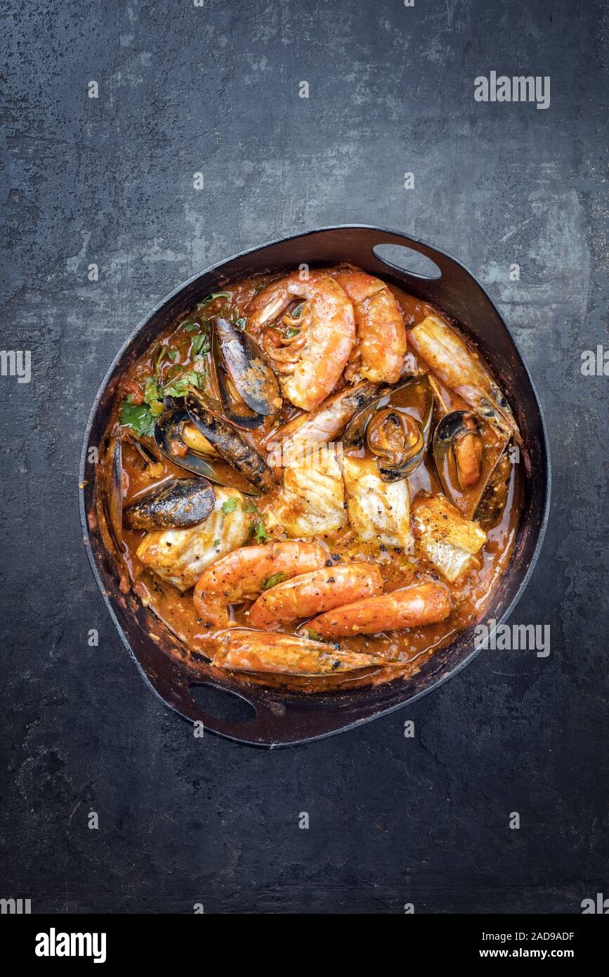 Traditional Catalan fish stew romesco de peix with prawns Stock Photo ...