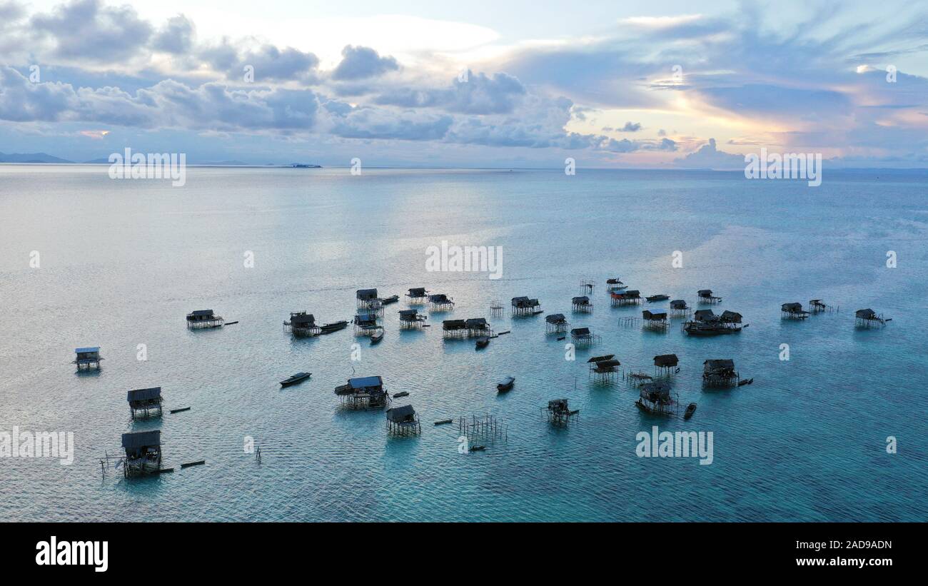 Aerial view of ocean, island and sea gypsy water village in Semporna ...