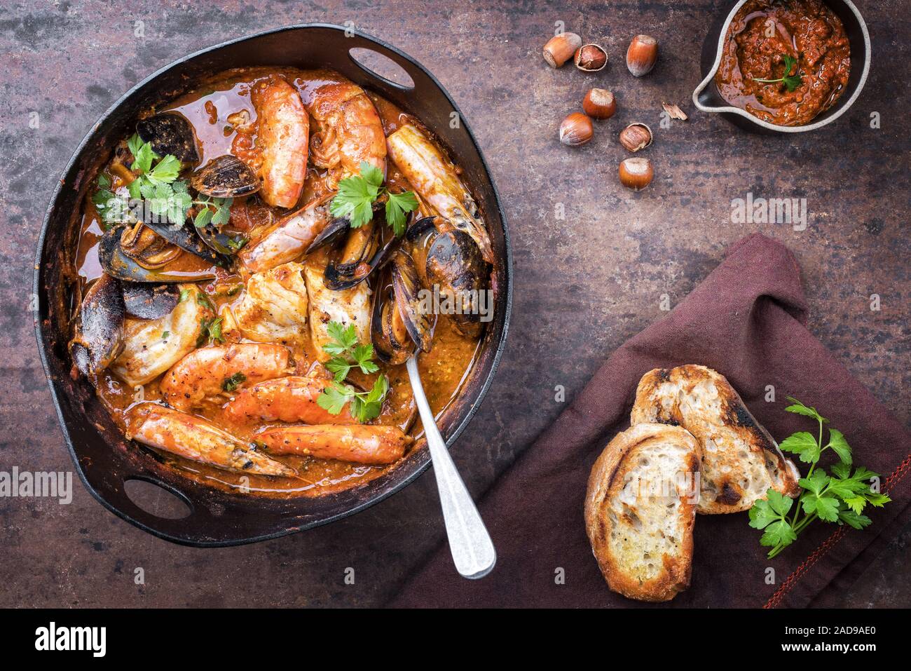Traditional Catalan fish stew romesco de peix with prawns Stock Photo ...