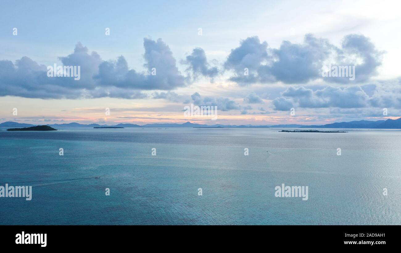Aerial view of ocean, island and sea gypsy water village in Semporna ...