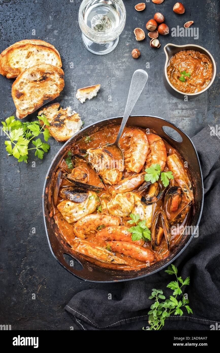 Traditional Catalan fish stew romesco de peix with prawns Stock Photo ...