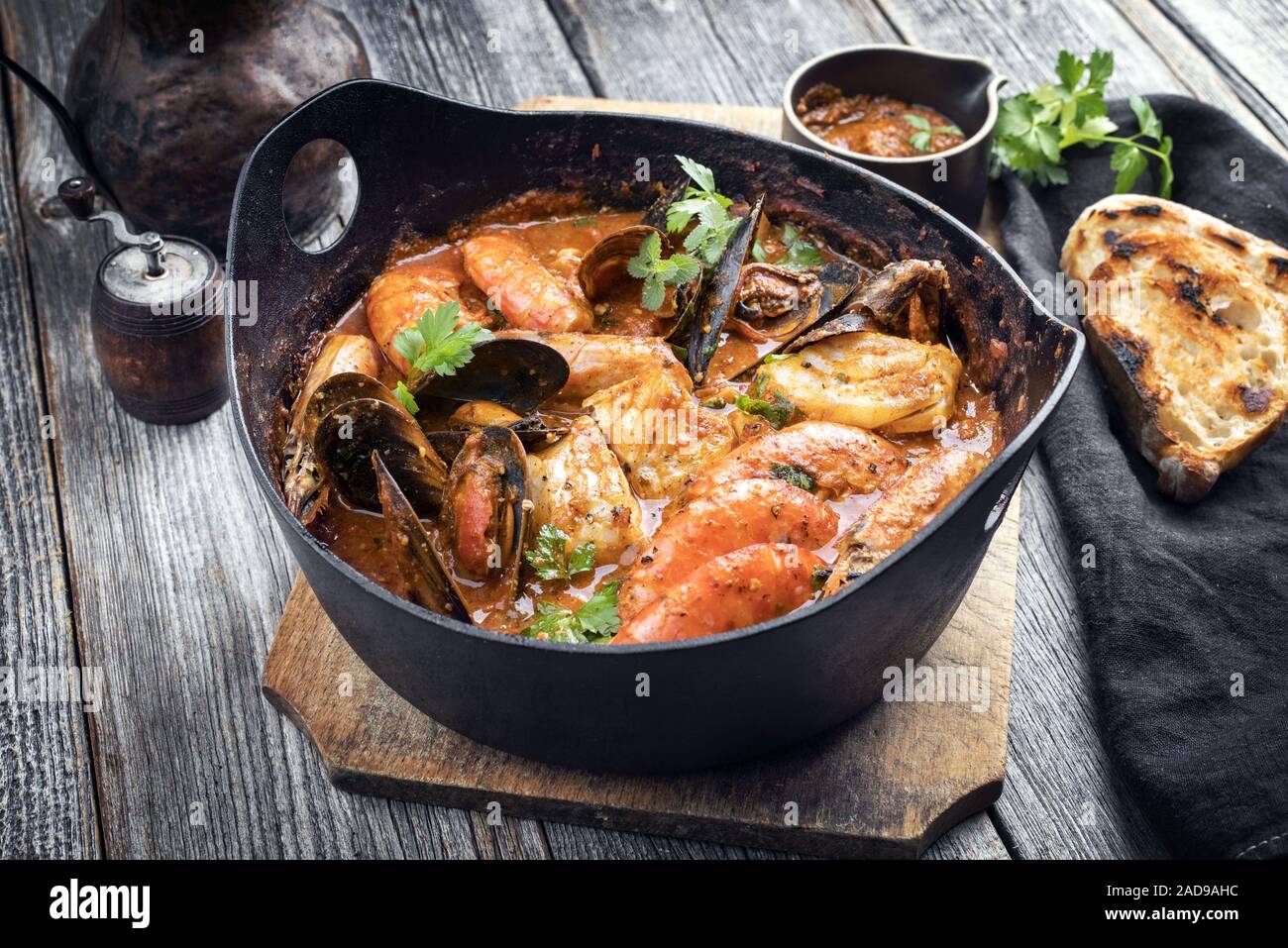 Traditional Catalan fish stew romesco de peix with prawns Stock Photo ...