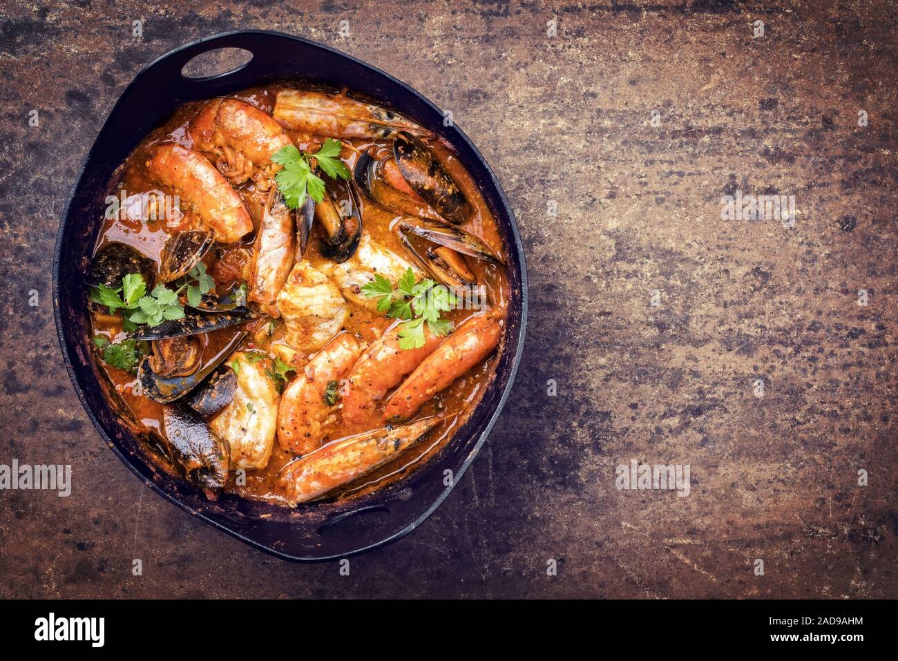 Traditional Catalan fish stew romesco de peix with prawns Stock Photo ...