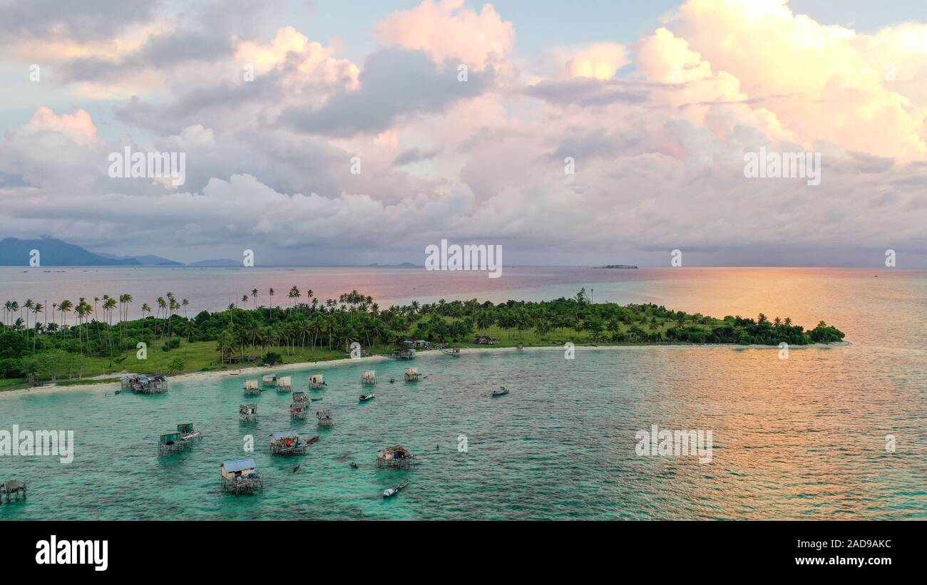 Aerial view of ocean, island and sea gypsy water village in Semporna ...