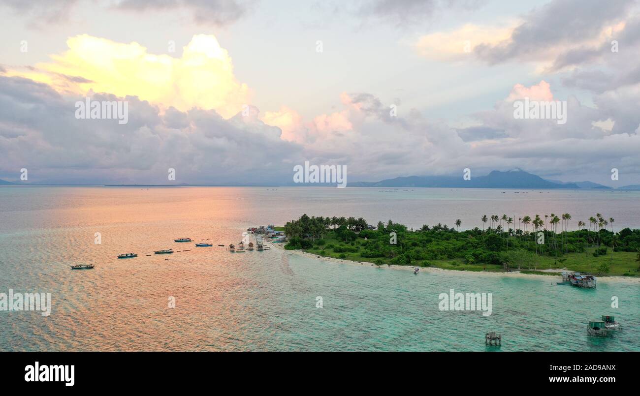 Aerial view of ocean, island and sea gypsy water village in Semporna ...