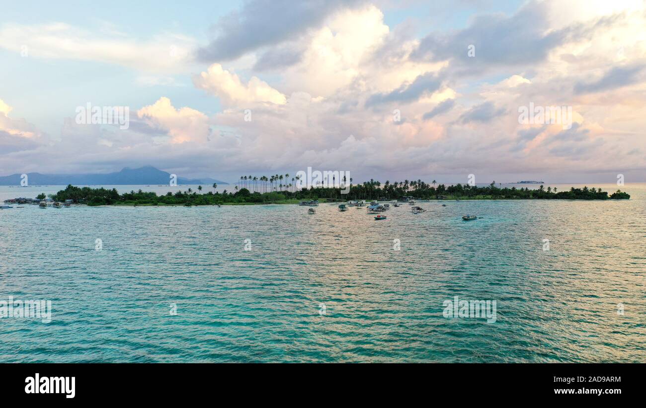 Aerial view of ocean, island and sea gypsy water village in Semporna ...